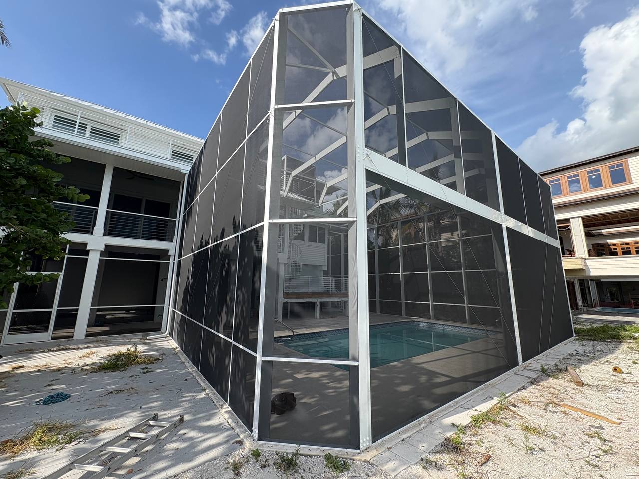 Before & After: Two-Story Pool Cage with Picture View in Sanibel